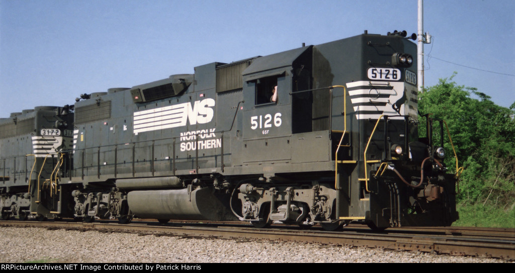 NS 5126 X-SOU 5126 GP38-2 leads an auto rack train southbound through Oliver Junction in New ...